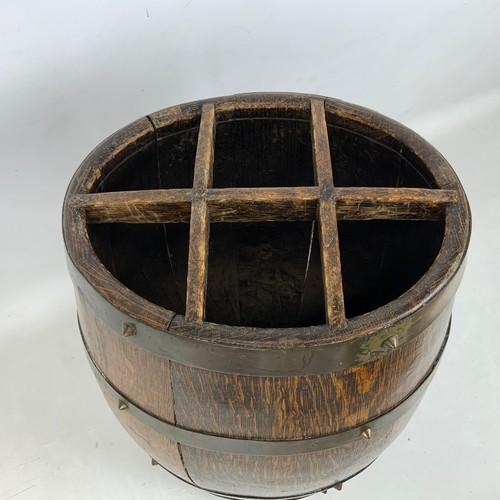 Stick stand in the form of an oval brass-bound and stud-work barrel ...
