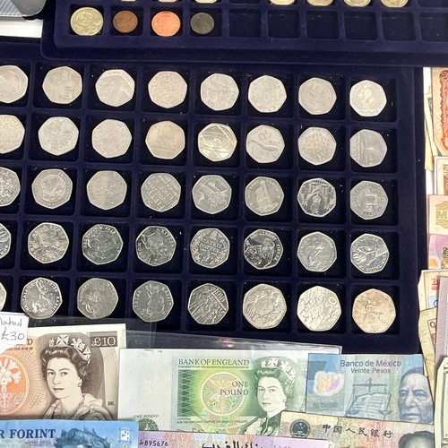 A collection of mixed modern coinage to include three £2 2002 ...