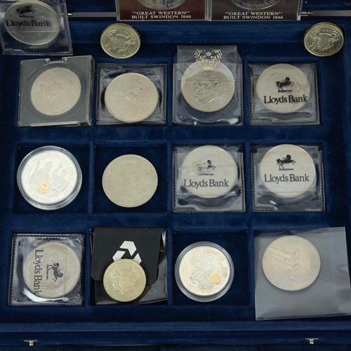 A collection of modern coins, to include two silver proof £5 coins, two ...