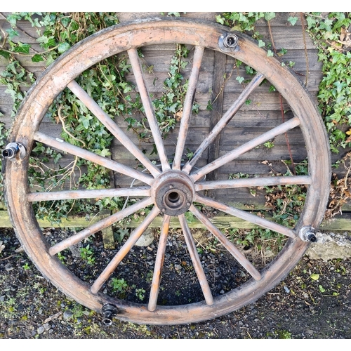 A Vintage Cartwheel Ceiling Light.