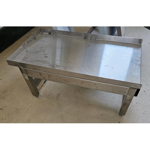 A small Stainless Steel Table.