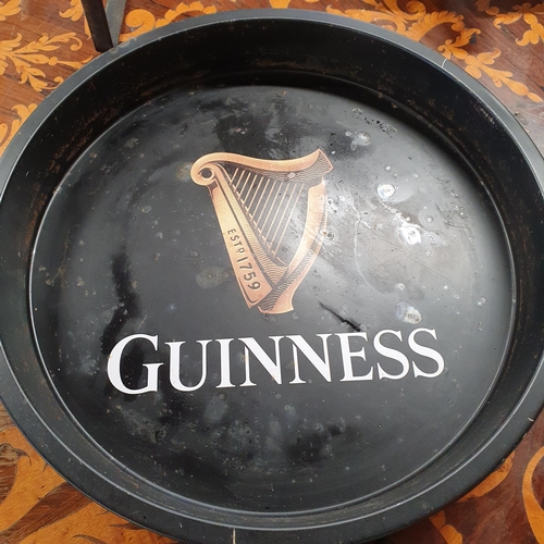 A Furstenberg beer Tap along with a quantity of Guinness Trays.