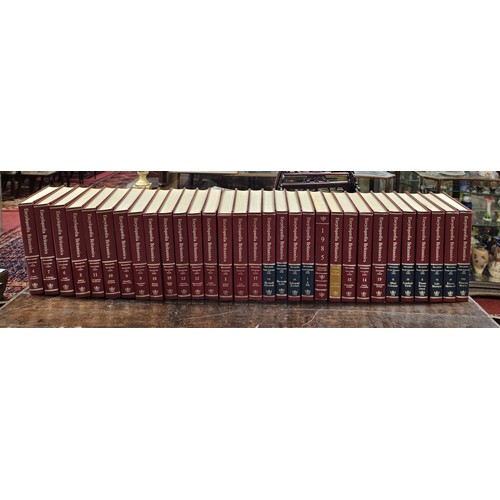 A large set of Encyclopaedia Britannica as bookcase fillers.