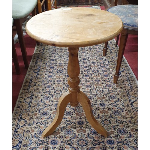 A good circular stripped Pine lamp Table. D 35 x H 56 cm approx.