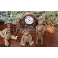 A good quantity of Teddies along with a clock.