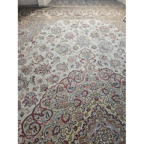A good and large cream ground Carpet with unique central medallion ...