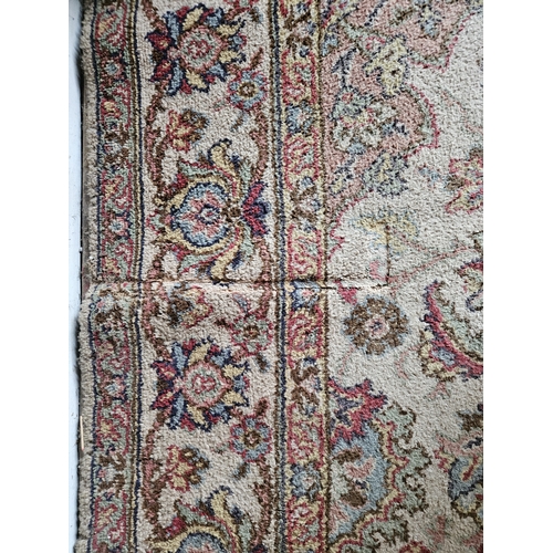A good and large cream ground Carpet with unique central medallion ...