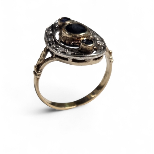 A lovely 18ct Gold, Diamond and Sapphire oval cluster Ring in the Art ...