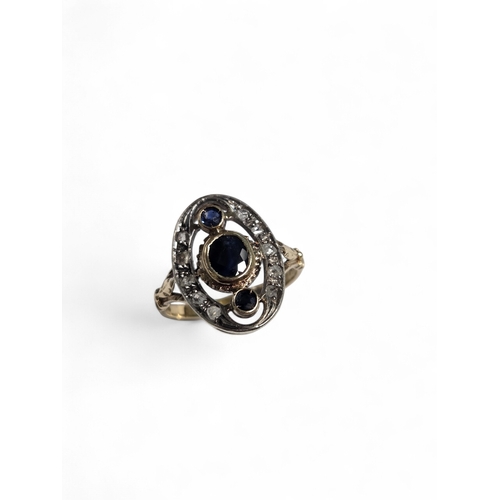 A lovely 18ct Gold, Diamond and Sapphire oval cluster Ring in the Art ...