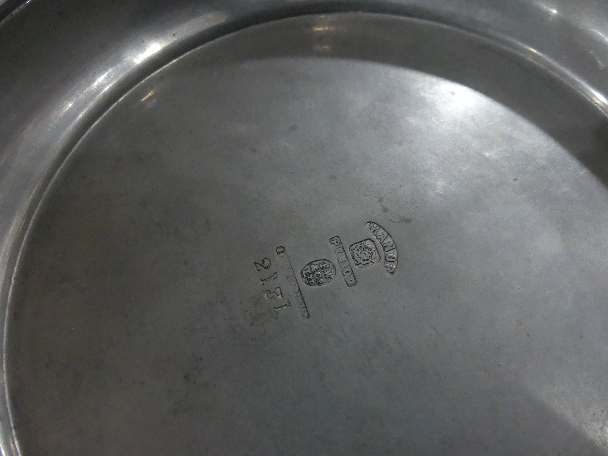 A large 'Manor Period' hammered Pewter Tankard, by T. W. & Co, together ...