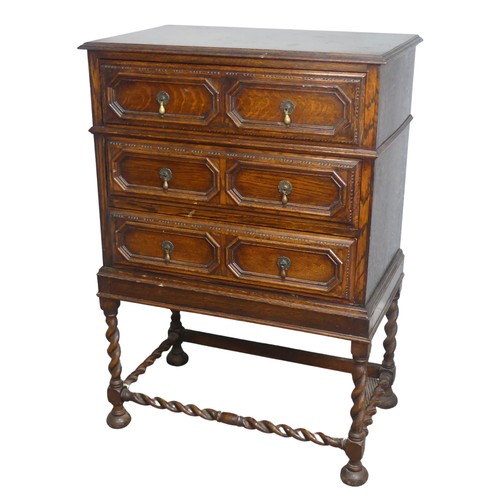 A Carolean style Early 20th century oak Chest on stand, three long ...
