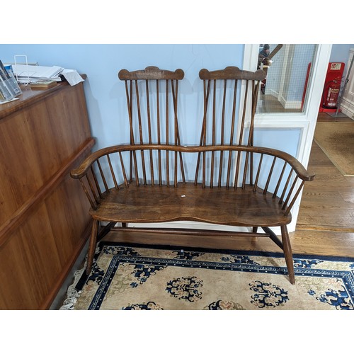 A double Windsor comb back Settle / Bench, comb stick back above shaped ...