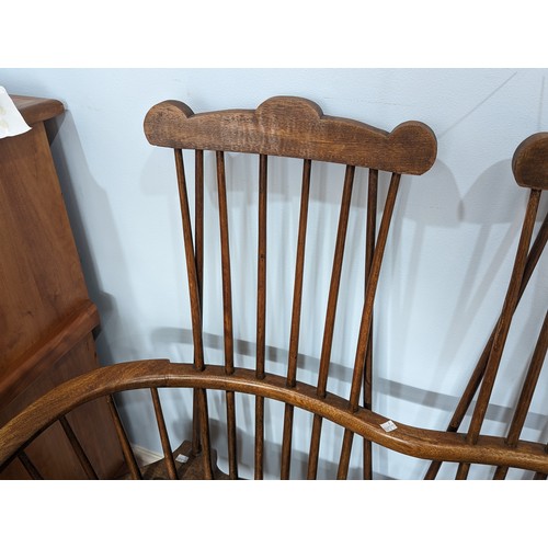 A double Windsor comb back Settle / Bench, comb stick back above shaped ...