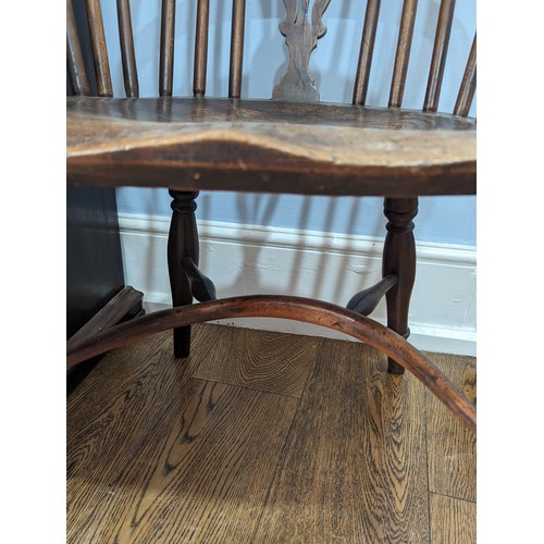 A double Windsor comb back Settle / Bench, comb stick back above shaped ...