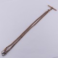 A 9ct rose gold curb link Watch Chain, with a clip at each end, the ...