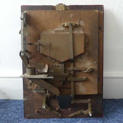 An early 20th century Allwin style penny slot Machine, housed in oak case with internal metal ball t