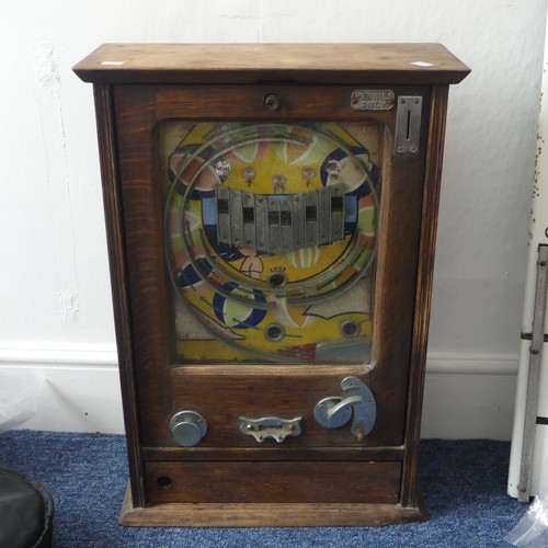 An early 20th century Allwin style penny slot Machine, housed in oak ...