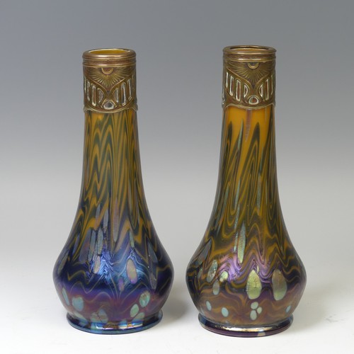 A pair of Loetz style iridescent glass Vases, with mounted gilt metal ...