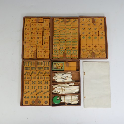 An early 20th century Mahjong Set, cased in a leather box, with ivorine ...