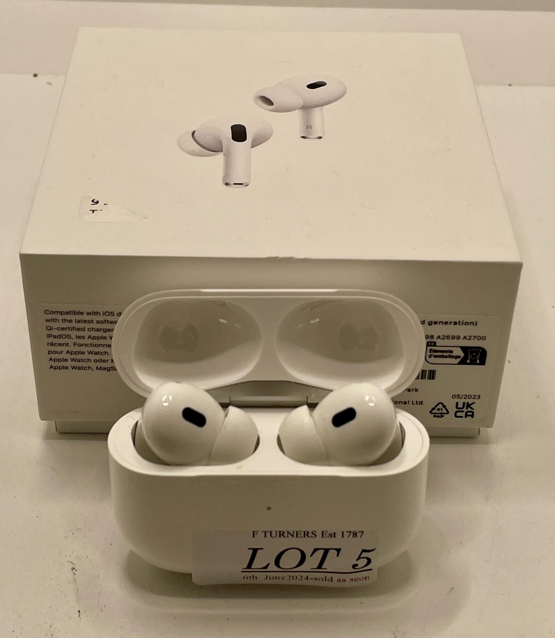 BOXED PAIR OF APPLE AIR POD PROS 2ND GEN WITH CHARGING WIRE AND EXTRA BUDS