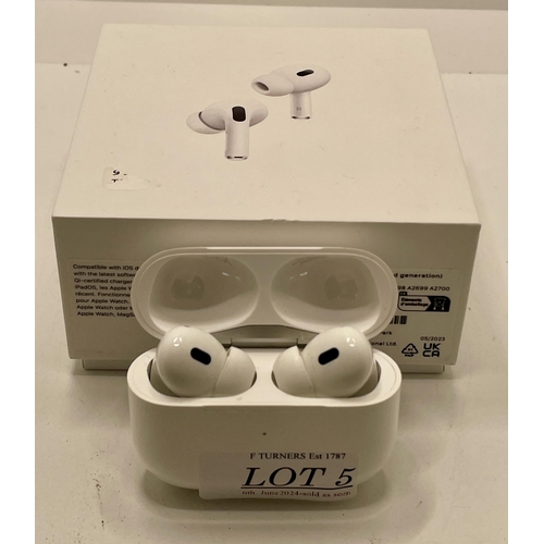 BOXED PAIR OF APPLE AIR POD PROS 2ND GEN WITH CHARGING WIRE AND EXTRA BUDS