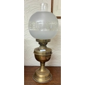 A VINTAGE BRASS/GLASS PARAFFIN LAMP WITH SHADE AND BULB - COMPLETE