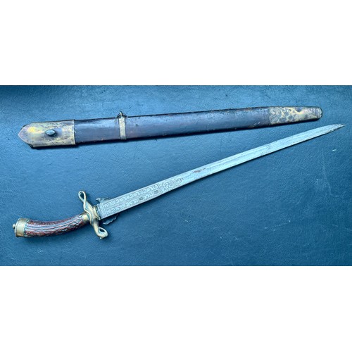 AN ANTIQUE GERMAN HUNTING DAGGER WITH LEATHER & BRASS SCABBARD - A ...
