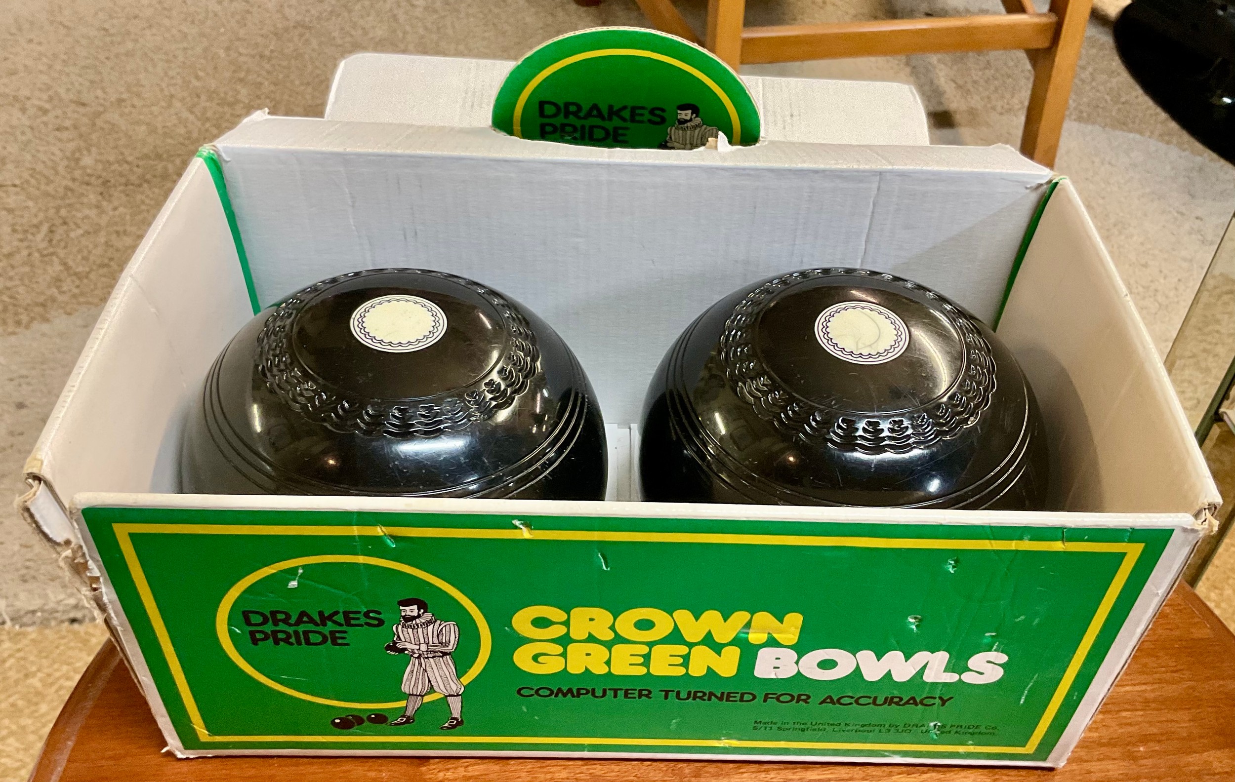 PAIR OF UNMARKED CROWN GREEN BOWLS IN DRAKES PRIDE BOX