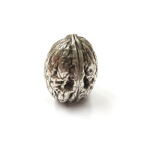 A silver model of a walnut stamped Tekform 925 to base