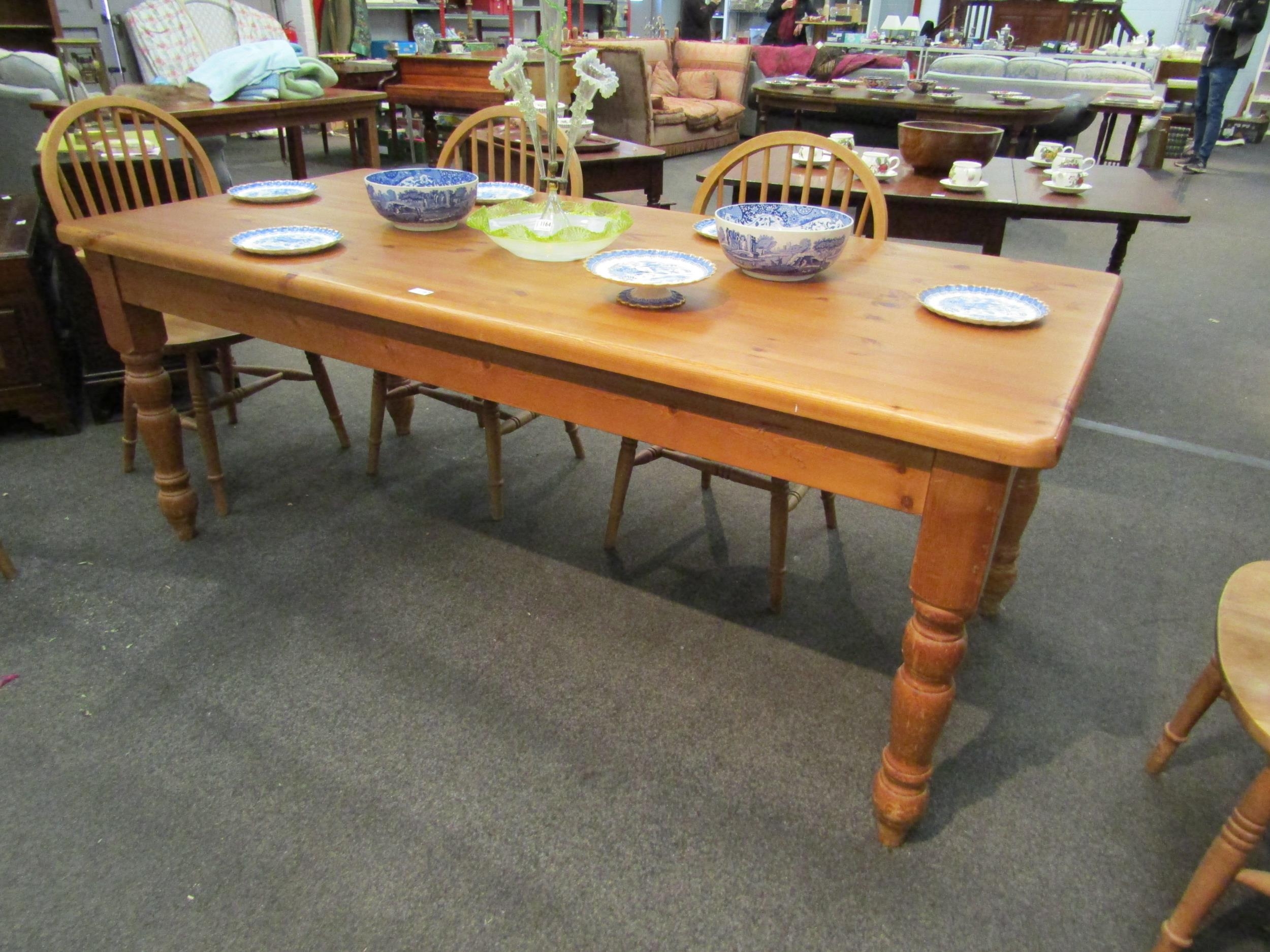 An Earsham Hall pine kitchen table, turned legs, 78cm high x 198cm long ...