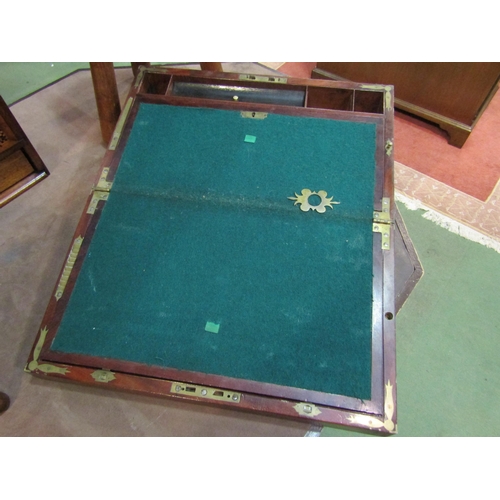 A 19th Century flame mahogany writing box, brass banded inlay and ...