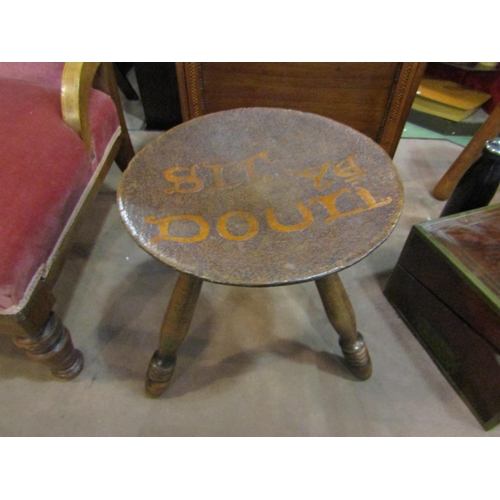 An Arts & Crafts style Scottish stool with motto to dished top, turned ...
