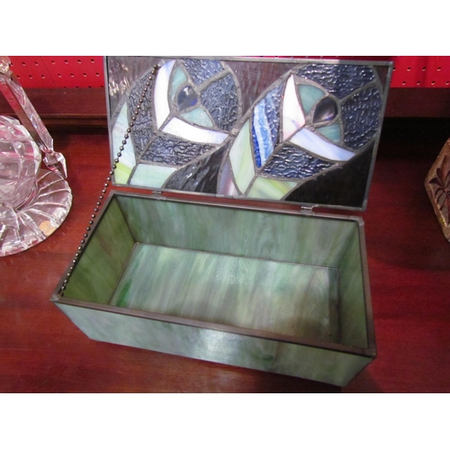 A Tiffany style lead glazed jewellery box with peacock feather lid ...