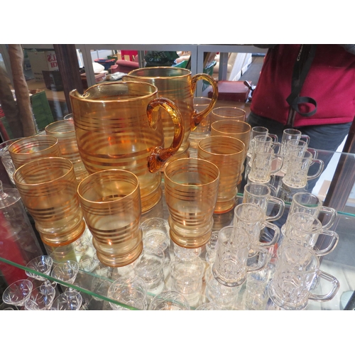 An Art Deco lemonade set together with six miniature tankards, crystal ...