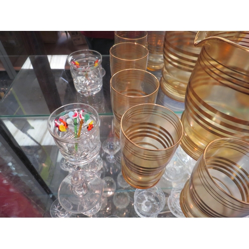 An Art Deco lemonade set together with six miniature tankards, crystal ...