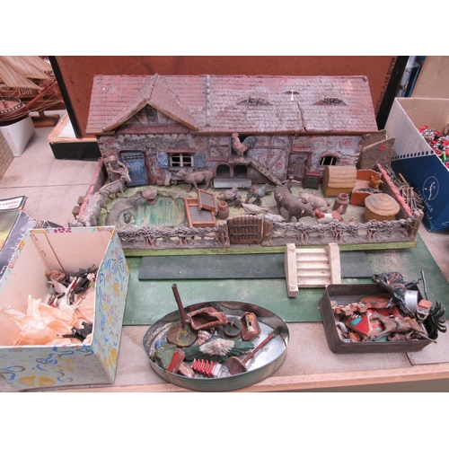 An Elastolin composition farmhouse with assorted Elastolin, lead and ...