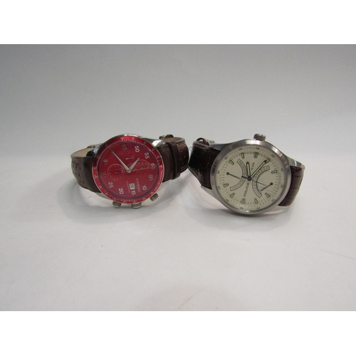 A Police 10 ATM watch and a Chr. Ward C7 Rapide Mk11 watch