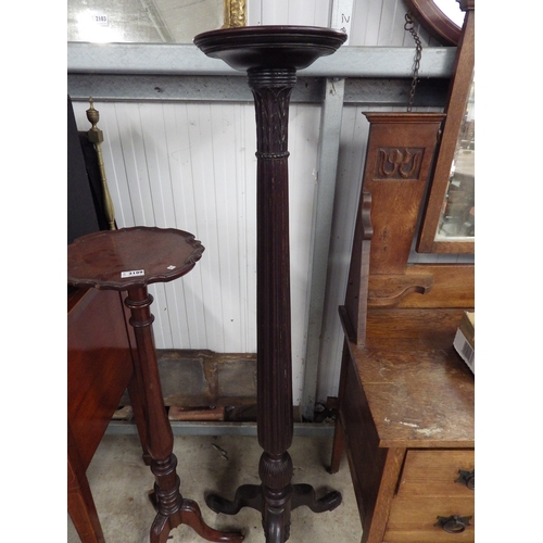 A fluted wood torchere