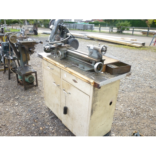 A Myford engineer's lathe with a leisure cabinet with contents. DTI ...