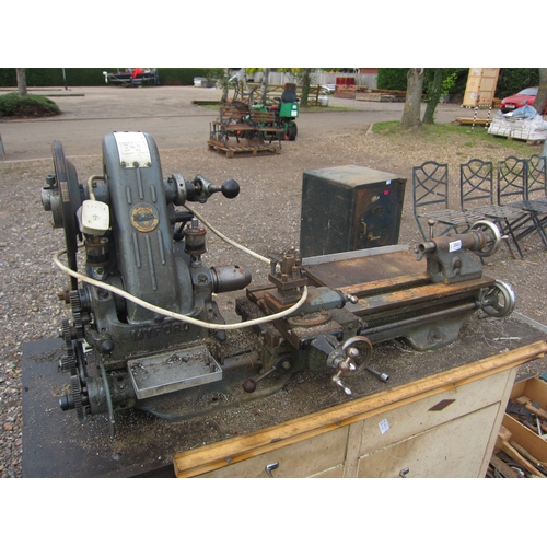 A Myford engineer's lathe with a leisure cabinet with contents. DTI ...