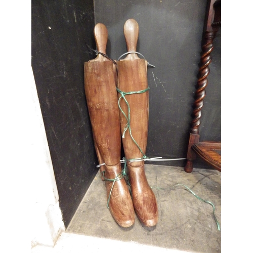 A pair of wooden riding boot trees