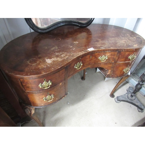 A 1930's walnut kidney shaped desk, a/f
