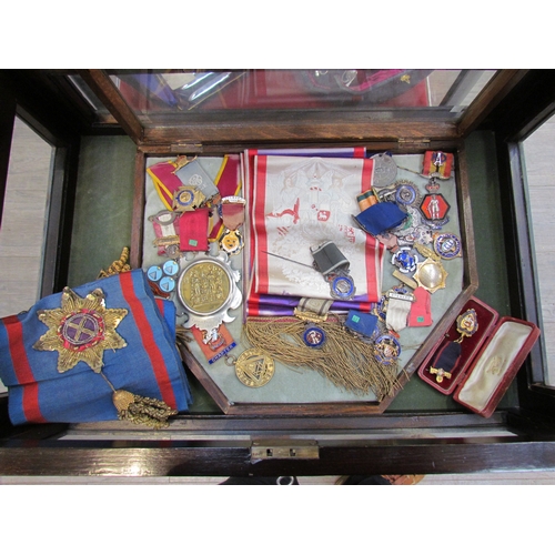 A collection of Masonic and RAOB medals and regalia including silver ...
