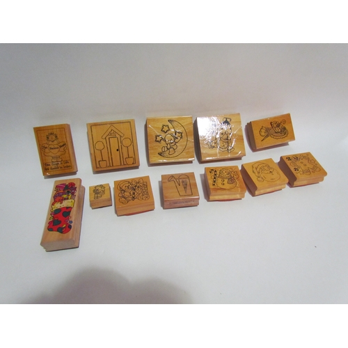 A box of wood and rubber printing blocks, Christmas and flower images
