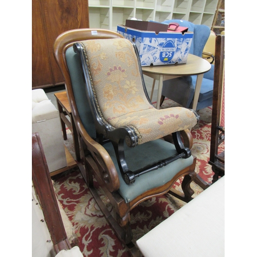 A Victorian mahogany rocking chair and a slipper chair