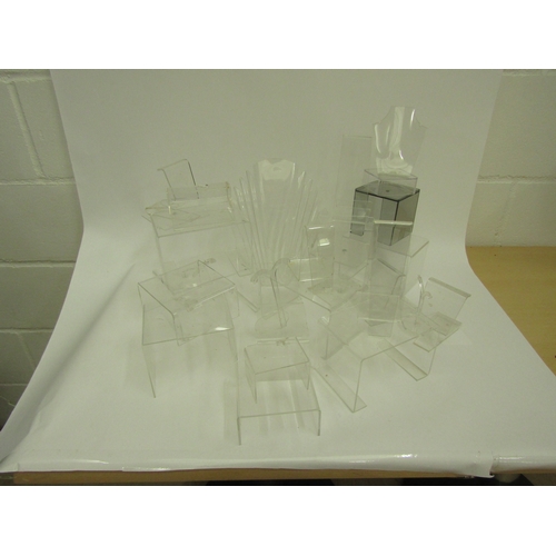 Two boxes containing Perspex and fabric covered jewellery display stands