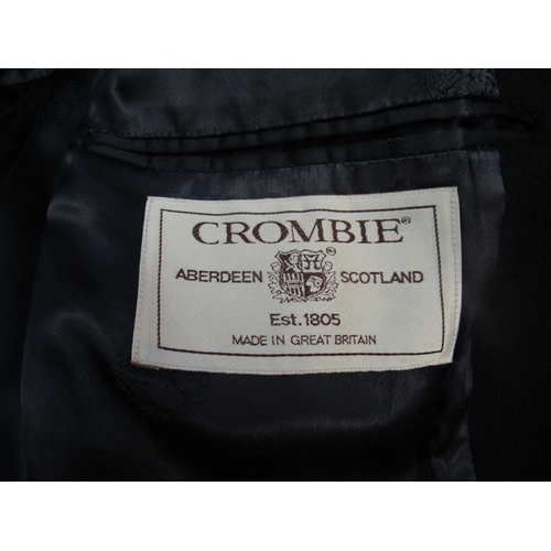 An original "Crombie" single breasted overcoat in navy wool and "The ...