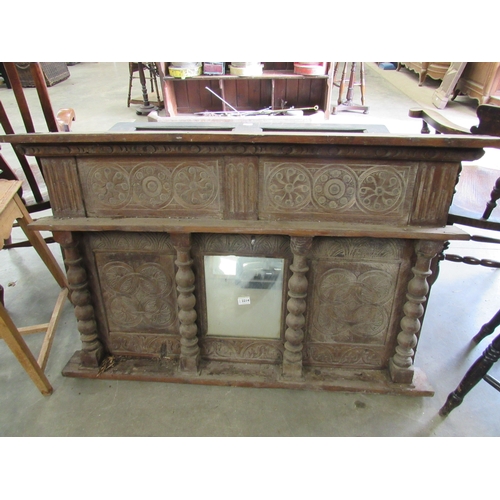 A 19th Century carved oak overmantel mirror, two carved sections ...