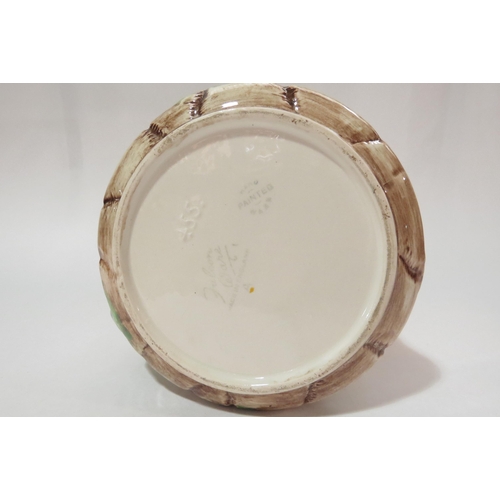 A Falcon Ware jug, handle as dovecote, decorated in high relief with ...