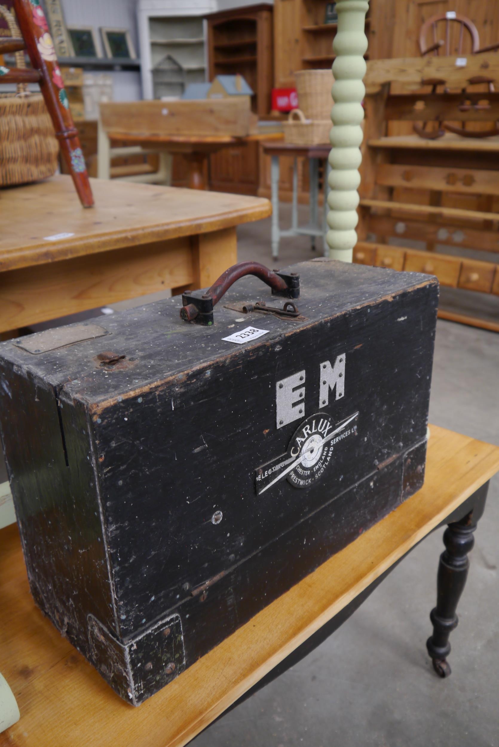A vintage workmans tool box with contents